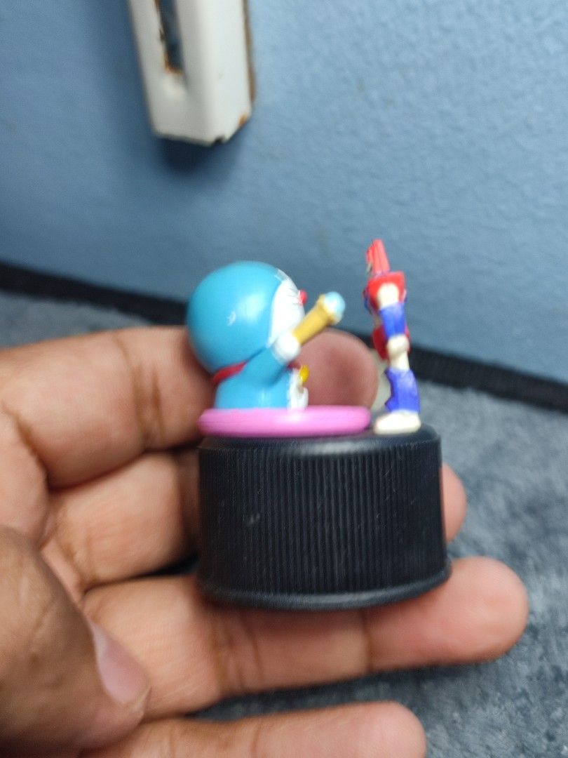 Doraemon bottle crown, Hobbies & Toys, Toys & Games on Carousell