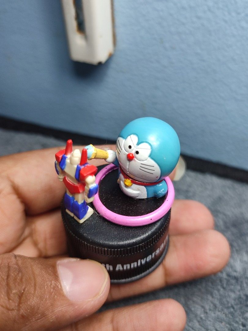 Doraemon bottle crown, Hobbies & Toys, Toys & Games on Carousell