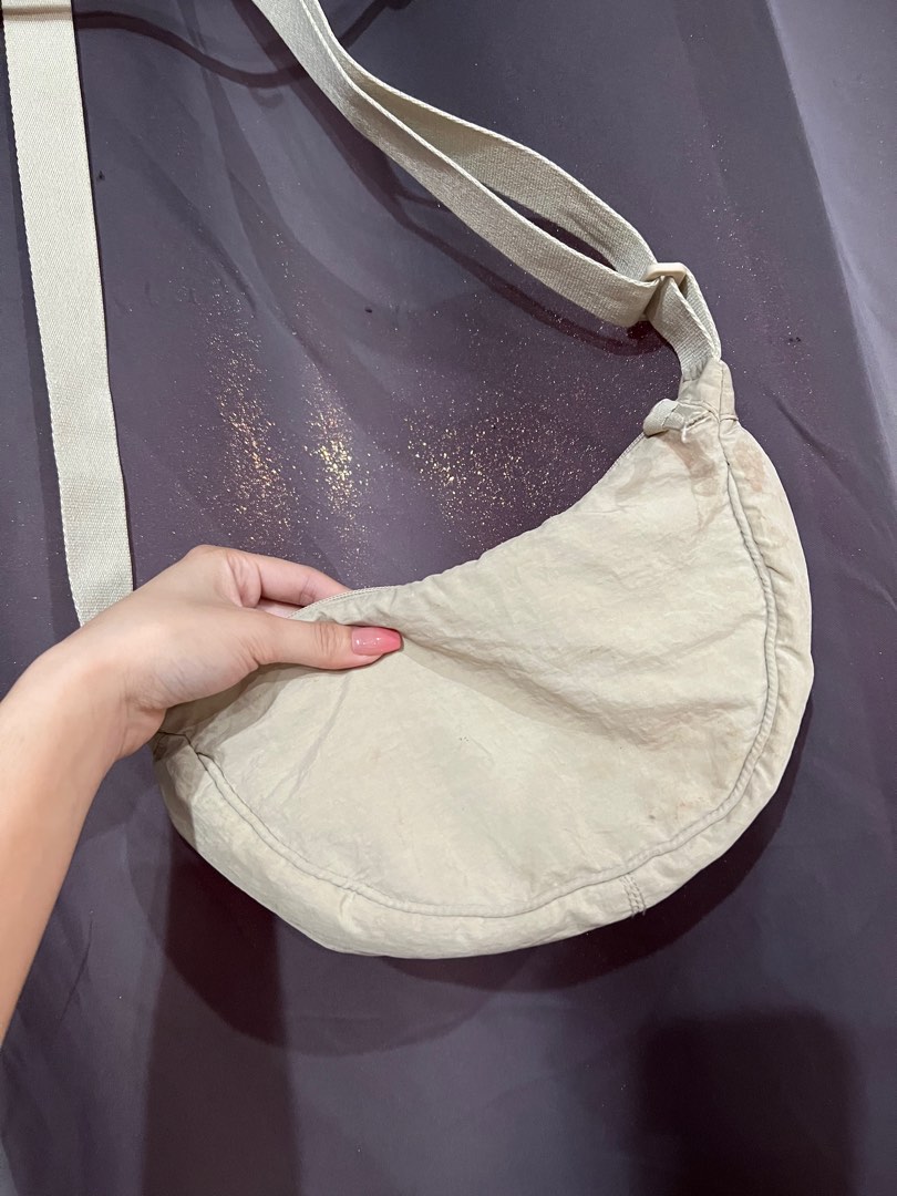 Uniqlo dumpling bag, Women's Fashion, Bags & Wallets, Cross-body Bags ...