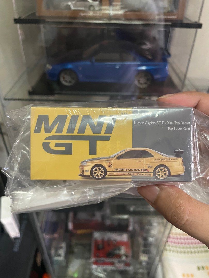MiniGT Nissan Skyline GTR R34 Top Secret Gold Mini GT, Hobbies & Toys ...