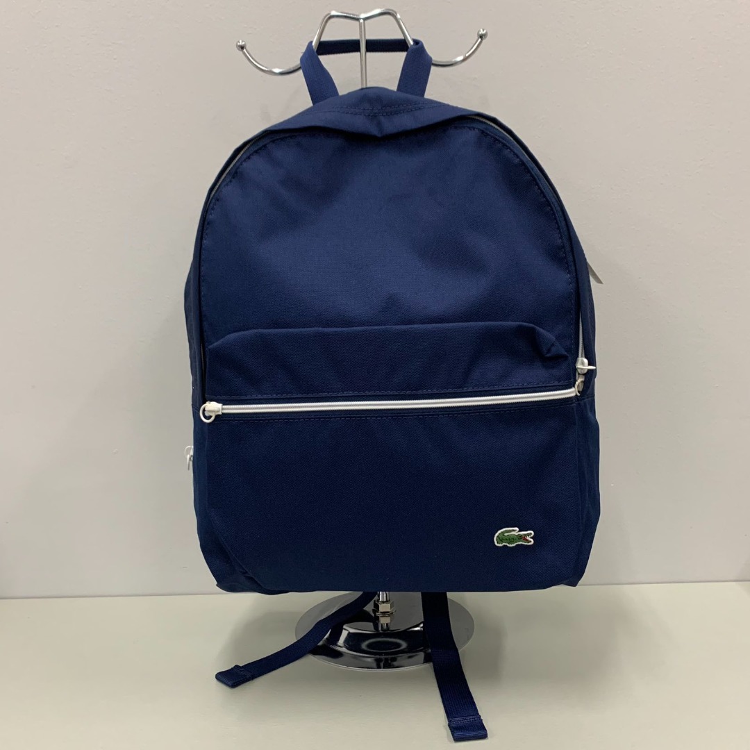 247002622 LACOSTE BACK PACK TAG BLUE, Luxury, Bags & Wallets on Carousell