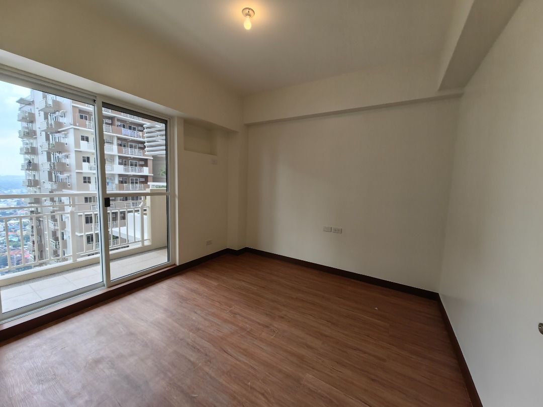 2bedroom 53.5sqm Bare Condo Unit with parking for Rent in Kapitolyo ...