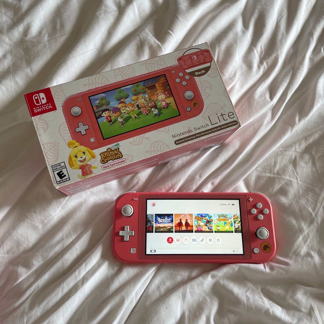 Nintendo Switch Lite Coral (Animal Crossing: Isabelle Aloha Edition ...