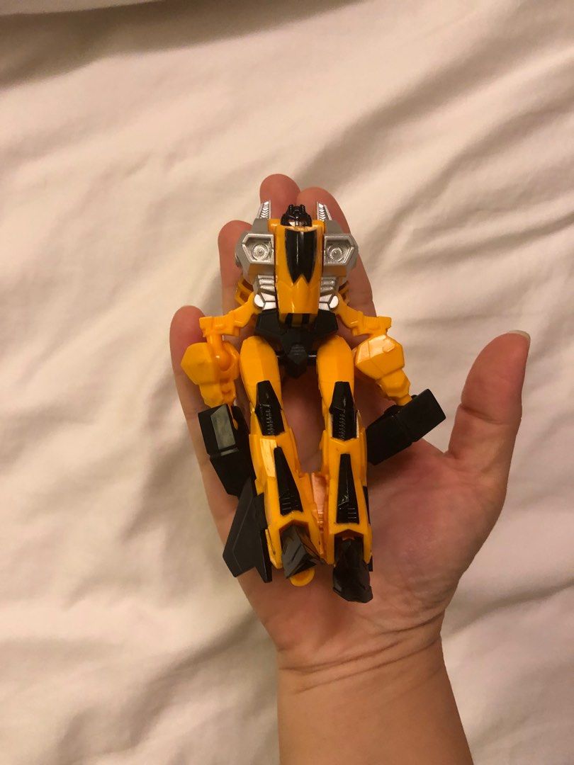Yellow Transformers 2, Hobbies & Toys, Toys & Games on Carousell
