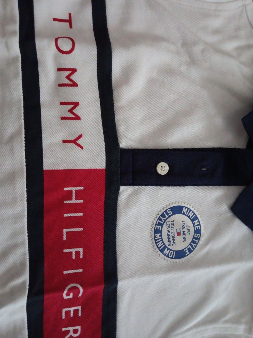 Polo shirt Tommy Hilfiger putih, Fesyen Pria, Pakaian , Atasan di Carousell