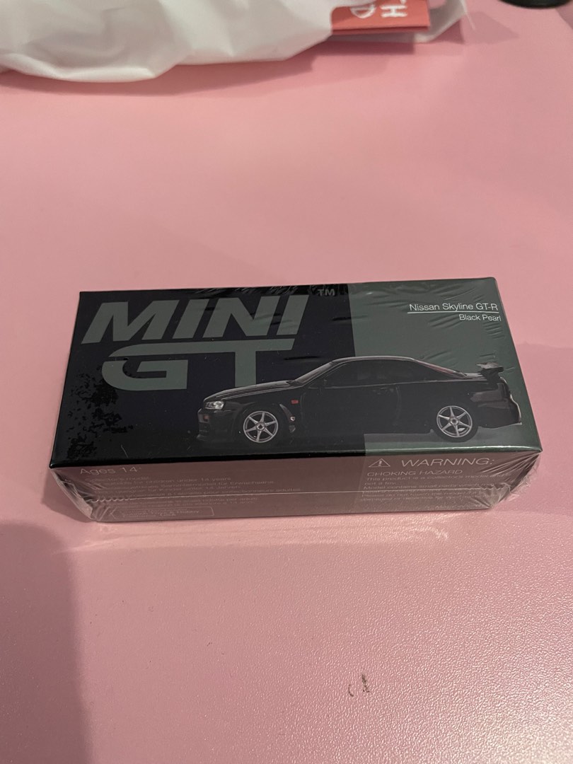 Mini GT Nissan Skyline GT-R #570, Hobbies & Toys, Toys & Games on Carousell