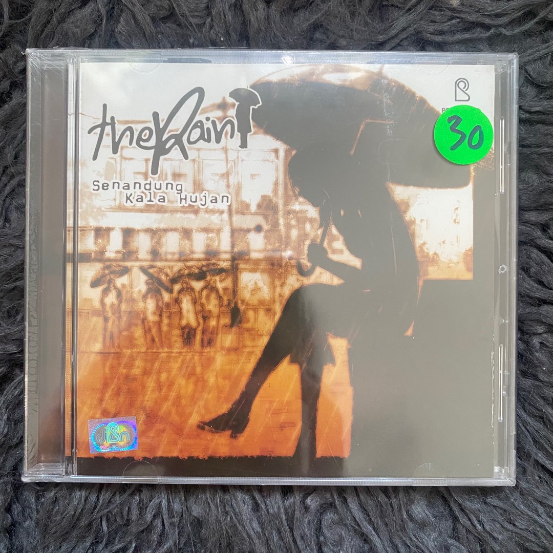CD THE RAIN Senandung Kala Hujan, Hobbies & Toys, Music & Media, CDs & DVDs on Carousell