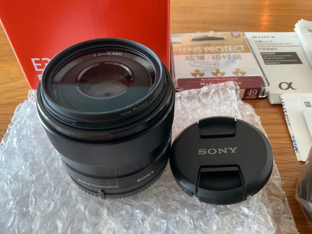 Sony SEL35F18 OSS 35mm F1.8 full set w/ lens protector, 攝影器材, 鏡頭及裝備 - Carousell