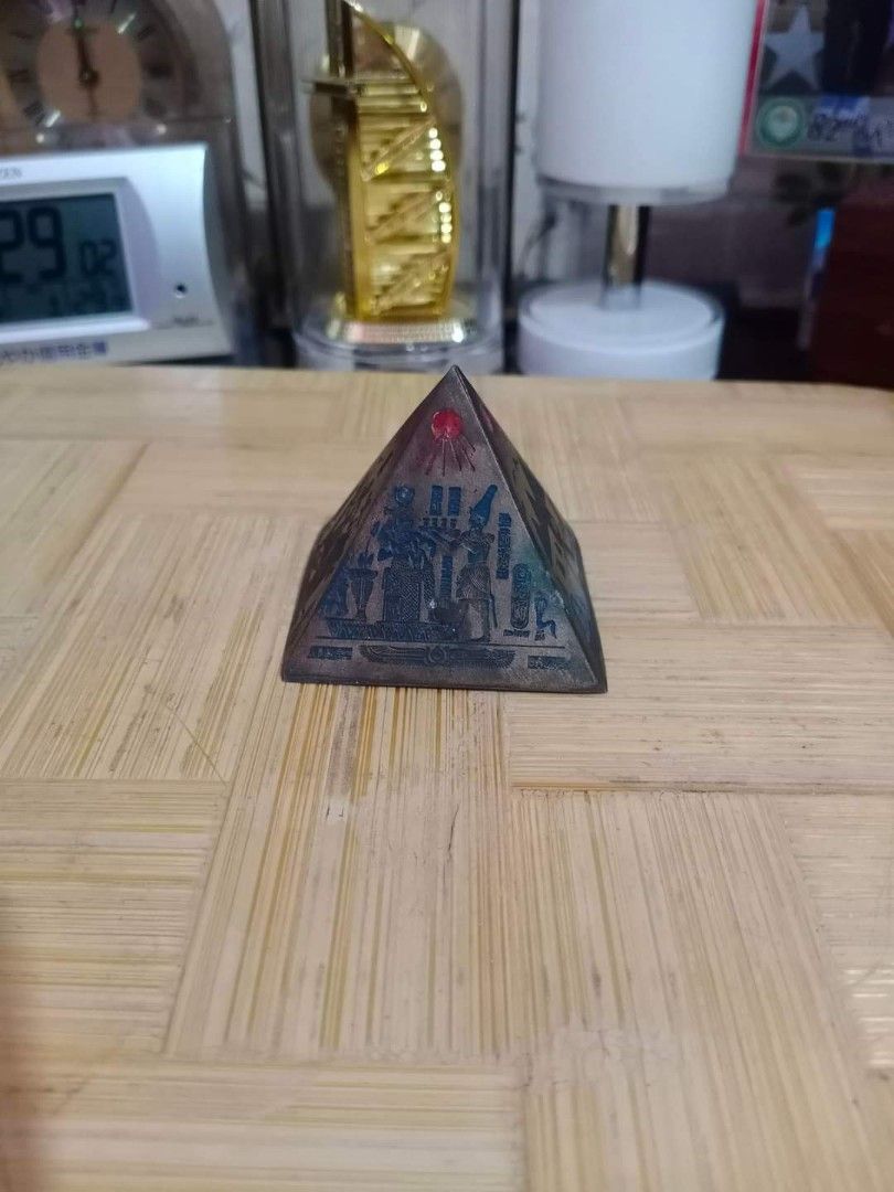 Egyptian Pyramid paperweight depicting ceremonial rituals, Hobbies ...