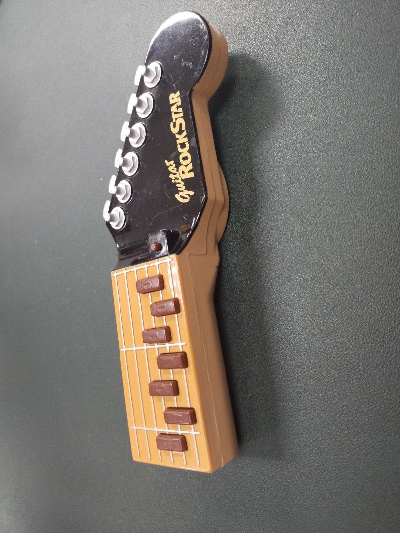 Tomy Guitar RockStar, Hobbies & Toys, Toys & Games on Carousell