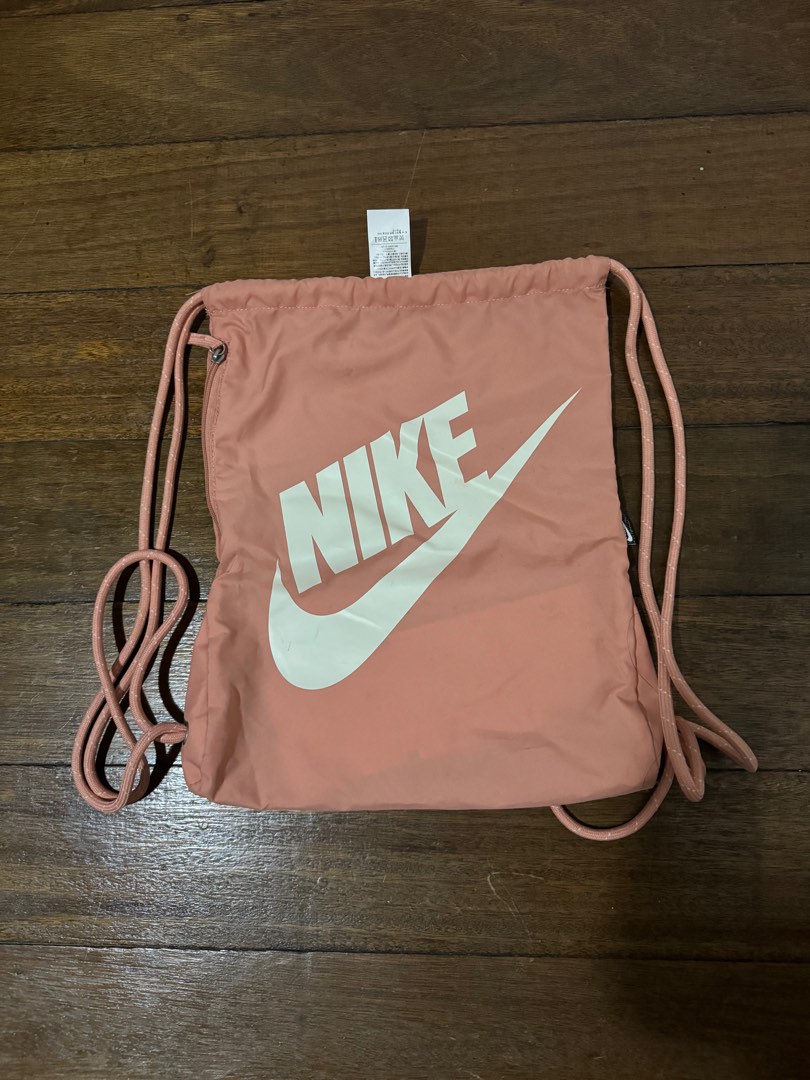 Nike pink drawstring bag, Women's Fashion, Bags & Wallets, Backpacks on ...