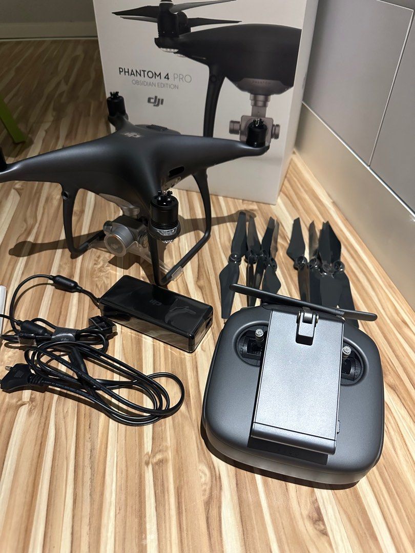 DJI PHANTOM 4 PRO OBSIDIAN EDITION, Photography, Drones on Carousell