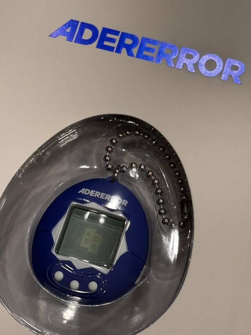 ADERERROR X TAMAGOTCHI, Hobbies & Toys, Toys & Games on Carousell