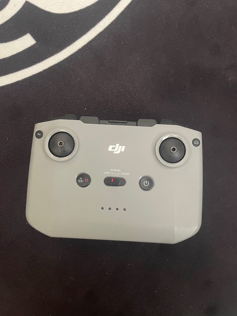 Used DJI Mini 2 remote controller, Photography, Drones on Carousell