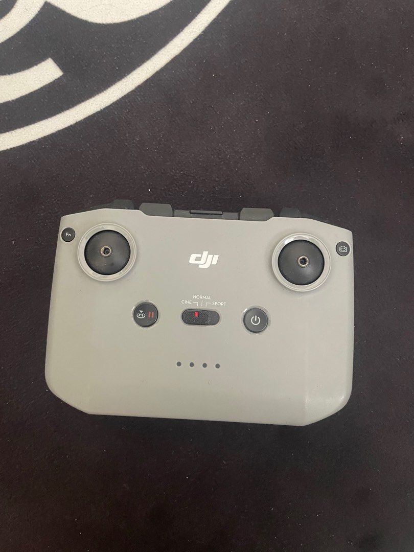 Used DJI Mini 2 remote controller, Photography, Drones on Carousell