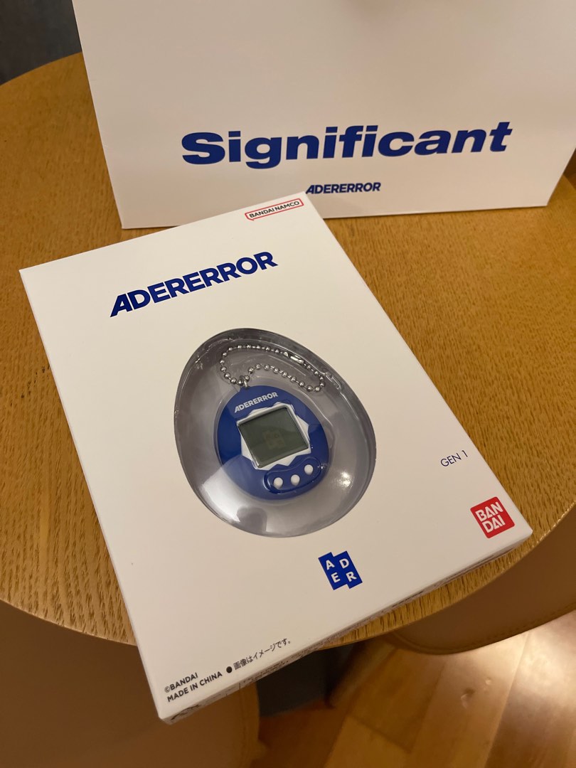 ADERERROR Tamagotchi, Hobbies & Toys, Toys & Games on Carousell