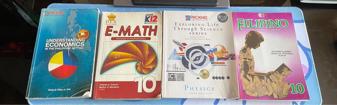 bundle of 3 textbooks E-math 10, understanding economics in the ...