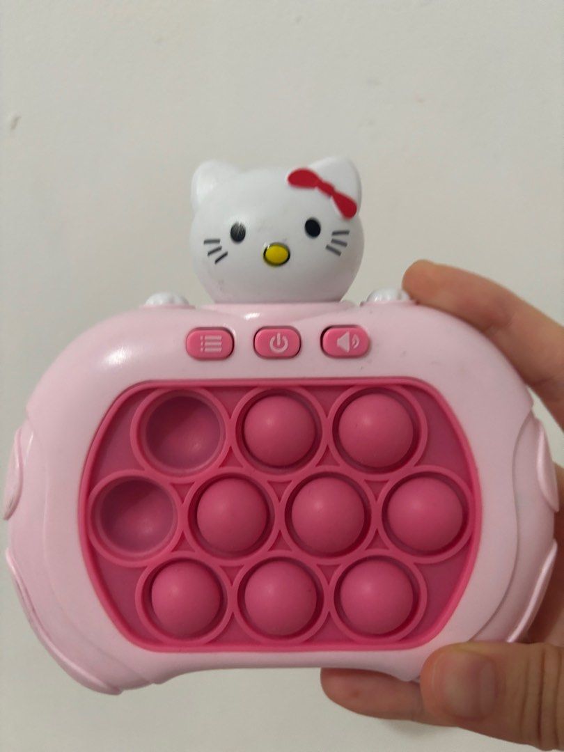Hello Kitty Pop It Machine, Bayi & Anak, Mainan & Baby Walker di Carousell