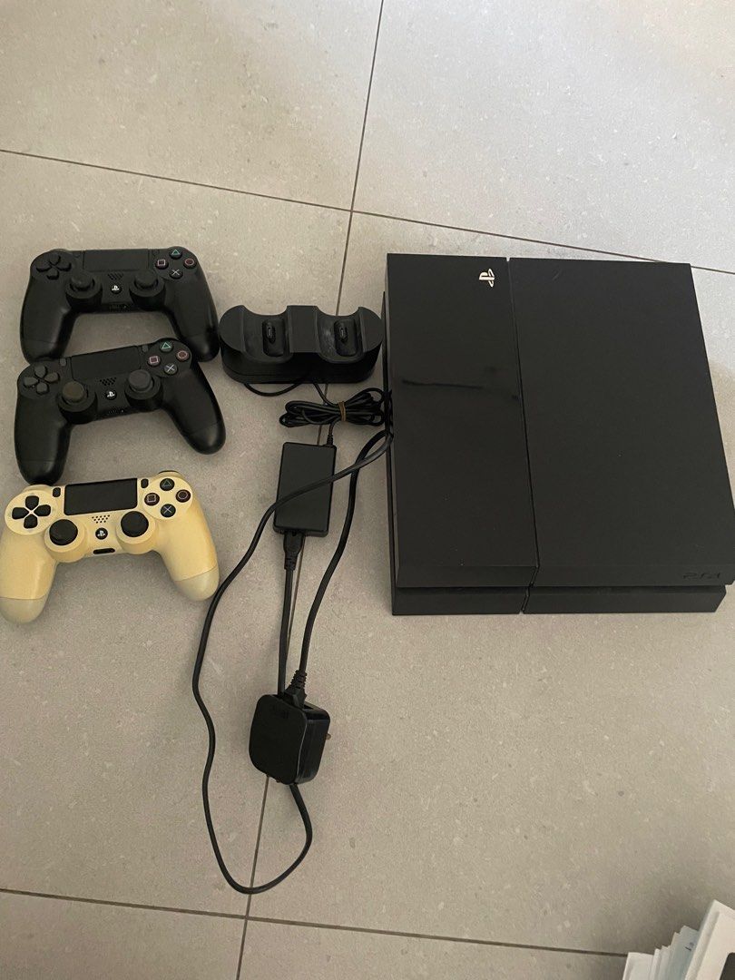 PS4 with 3 Controllers with Dual Charging Dock free games
