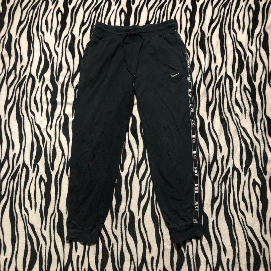 Nike side tape, Men's Fashion, Bottoms, Joggers on Carousell