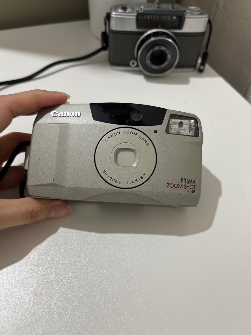 Canon Prima Zoom Shot w/ Free Film Roll, Photography, Cameras on Carousell