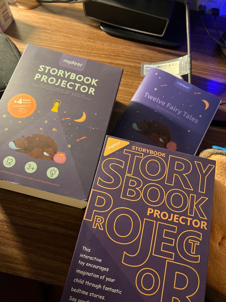 Storybook projector with 11 different stories, Hobbies & Toys, Books ...