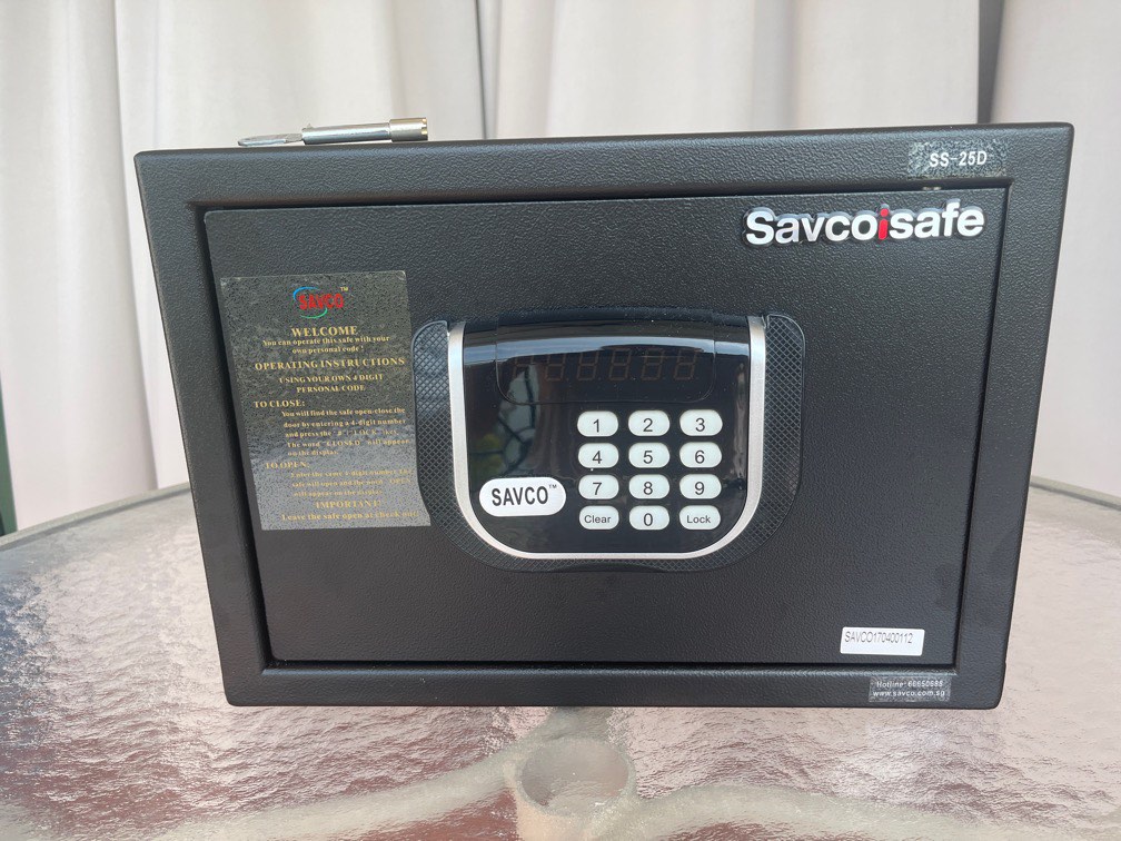Hotel-room-style home battery-powered safe, “Savco” brand, with ...
