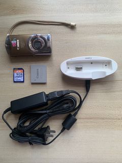 RARE canon ixus 95 in melon green, Photography, Cameras on Carousell