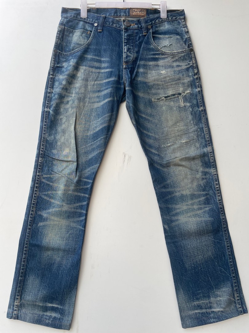 Wrangler ripped off style jeans, Men's Fashion, Bottoms, Jeans on Carousell