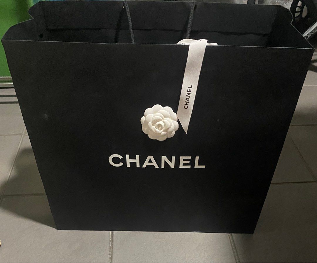 Chanel paper bag, Luxury, Bags & Wallets on Carousell