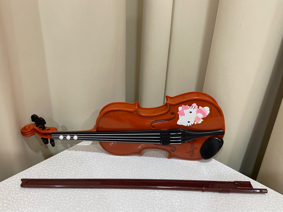 Vintage 2014 Hello Kitty Angel Musical Violin Toy, Audio, Portable Music Players on Carousell