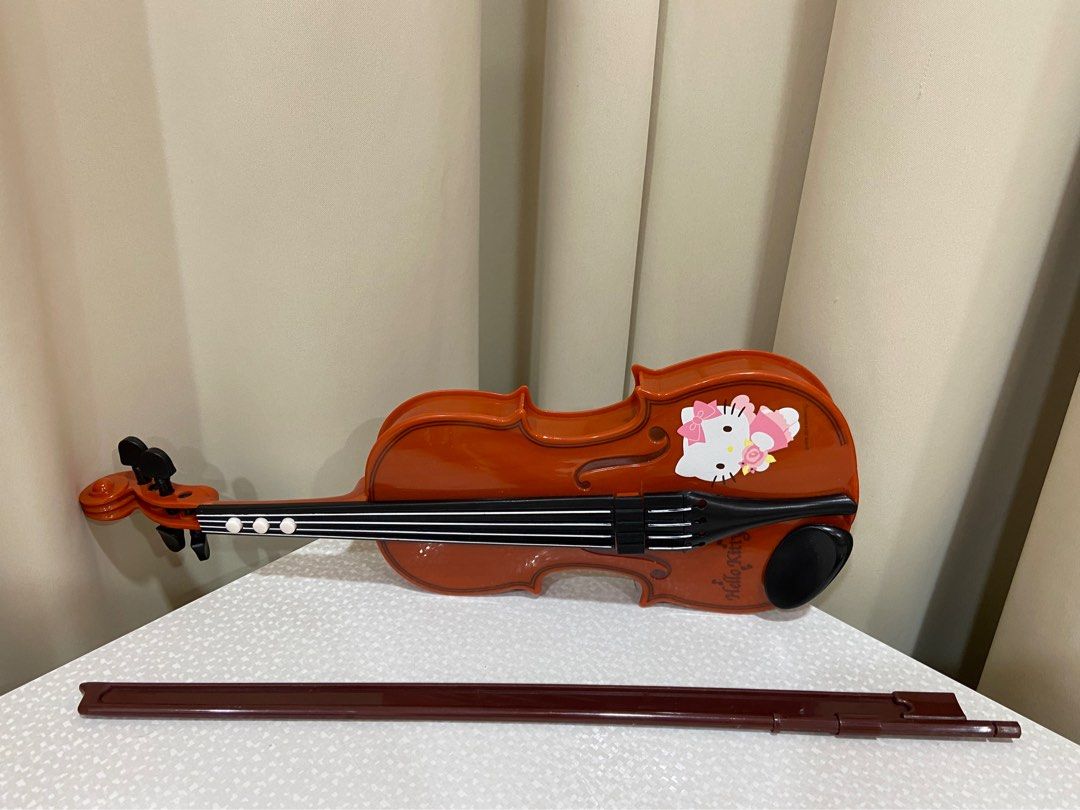 Vintage 2014 Hello Kitty Angel Musical Violin Toy, Audio, Portable Music Players on Carousell