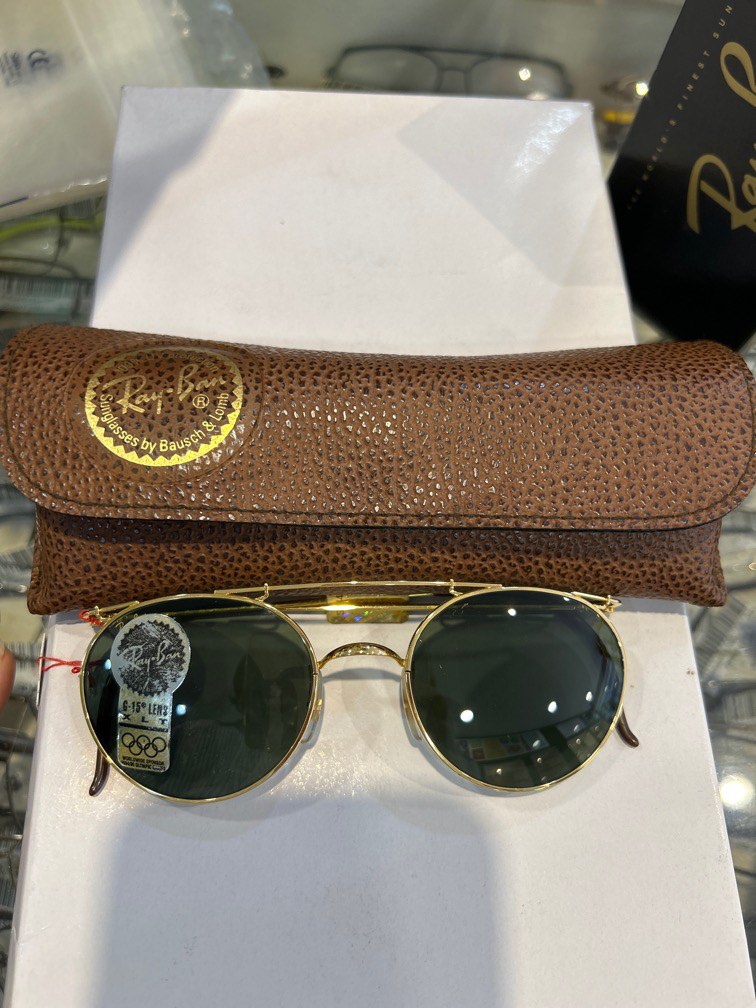 Ray ban deco metal round gold W1761, Men's Fashion, Watches ...