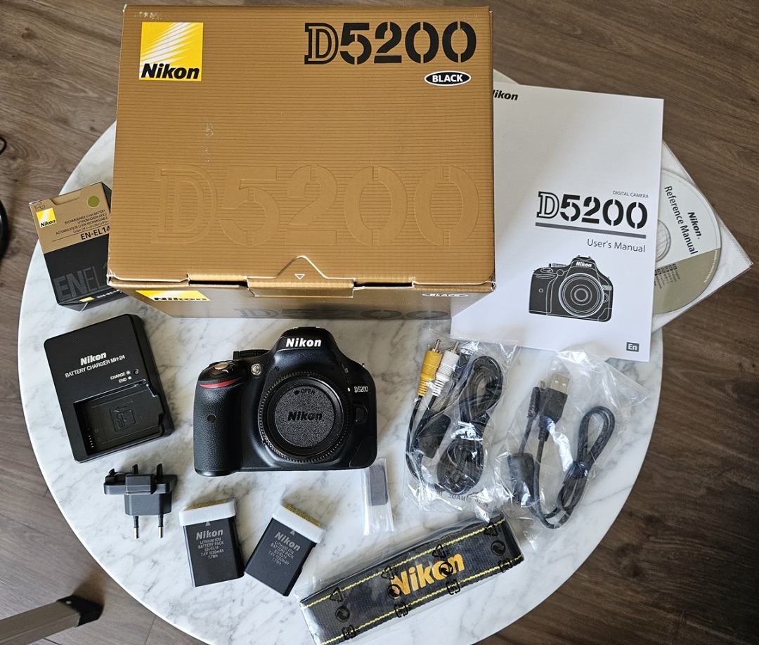 Nikon D5200 body and its accessories including Lowepro Camera bag ...