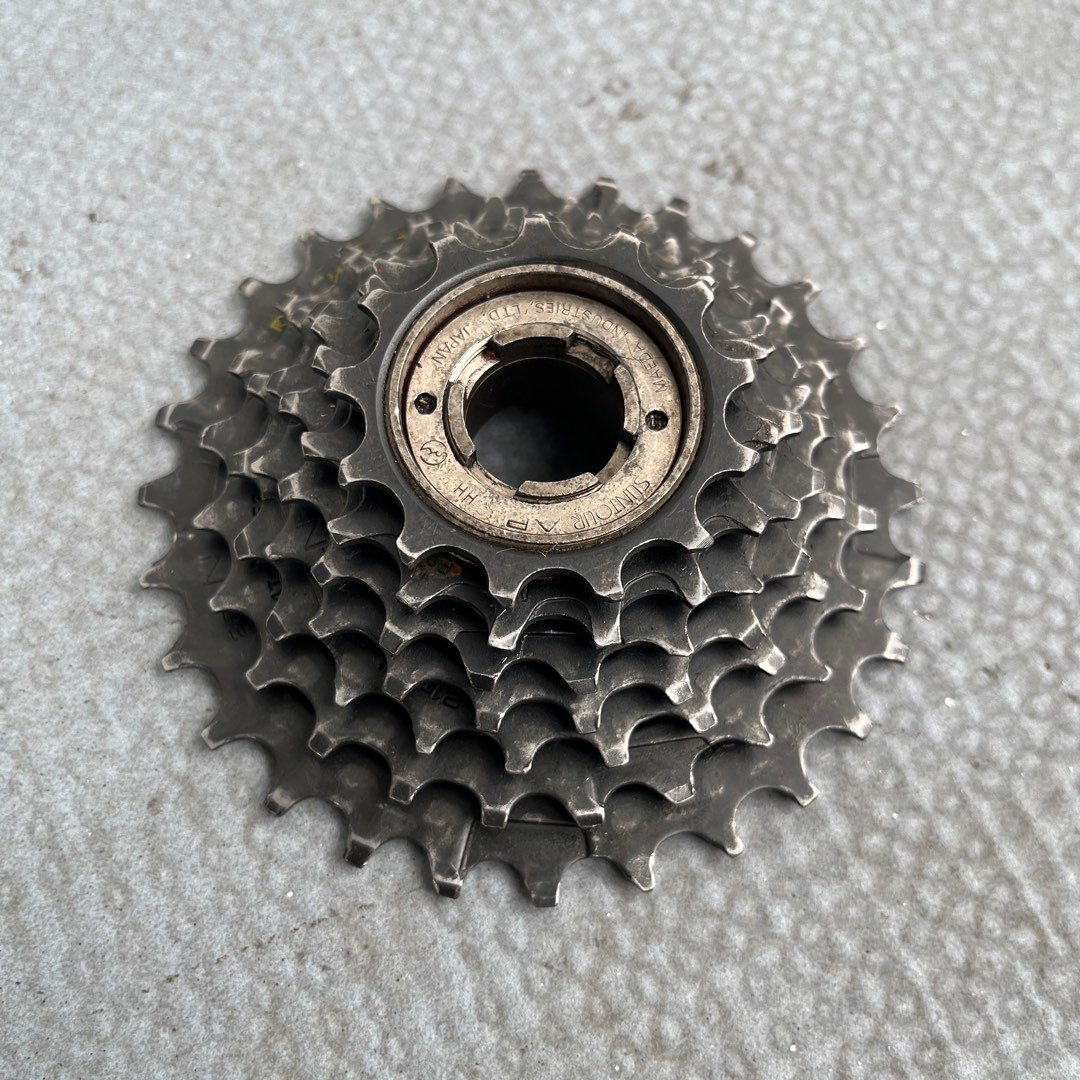 7 speed Suntour AP frewheel / cogs + spoke protector, Sports Equipment ...