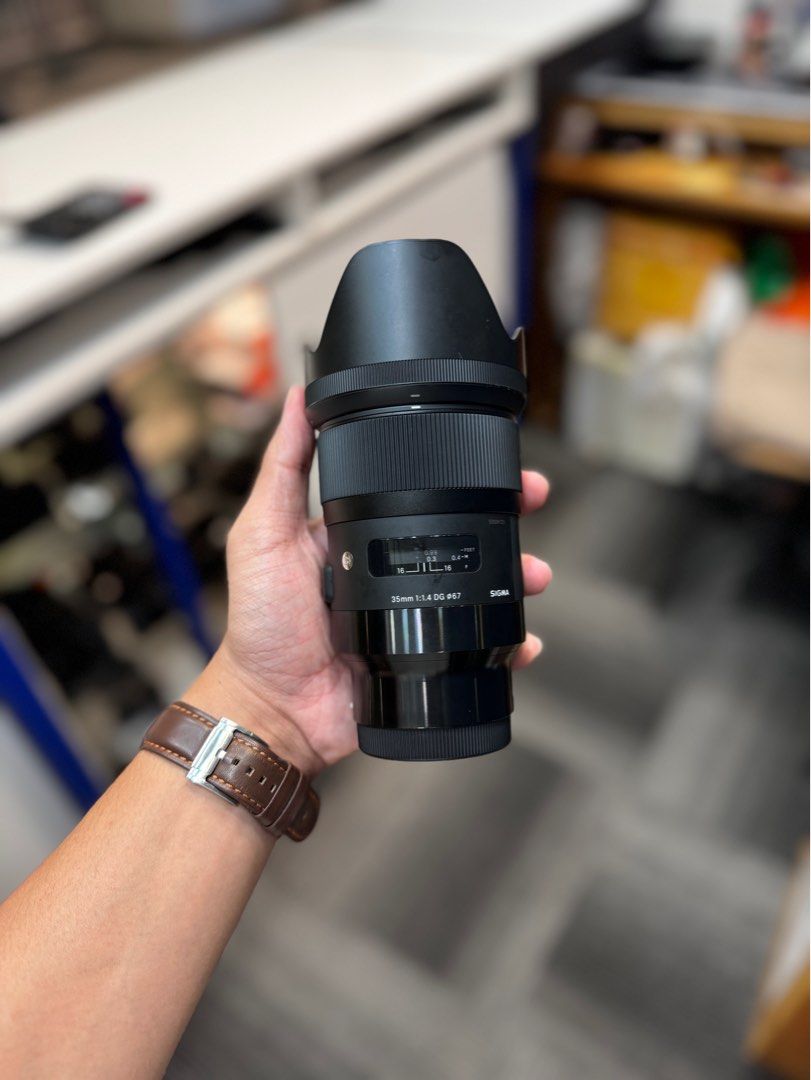 SONY 35MM F1.4 SIGMA ART FE, Photography, Lens & Kits on Carousell