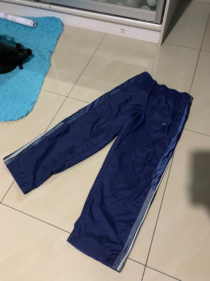 NIKE SIDE BUTTON TRACKPANTS, Men's Fashion, Bottoms, Joggers on Carousell