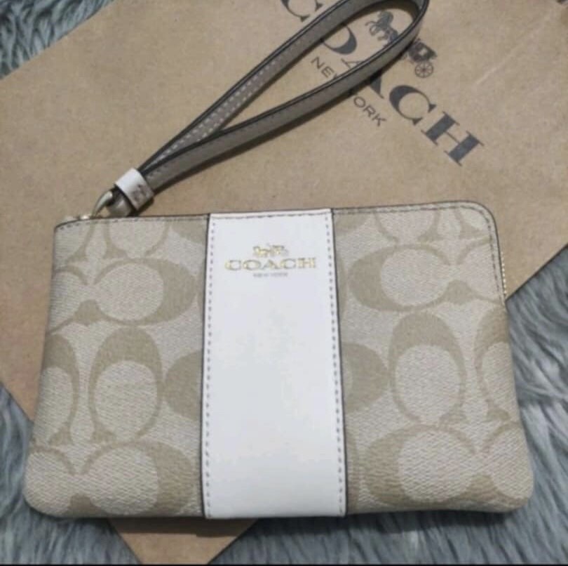 COACH Corner Zip Wristlet In Signature Canvas, Luxury, Bags & Wallets ...