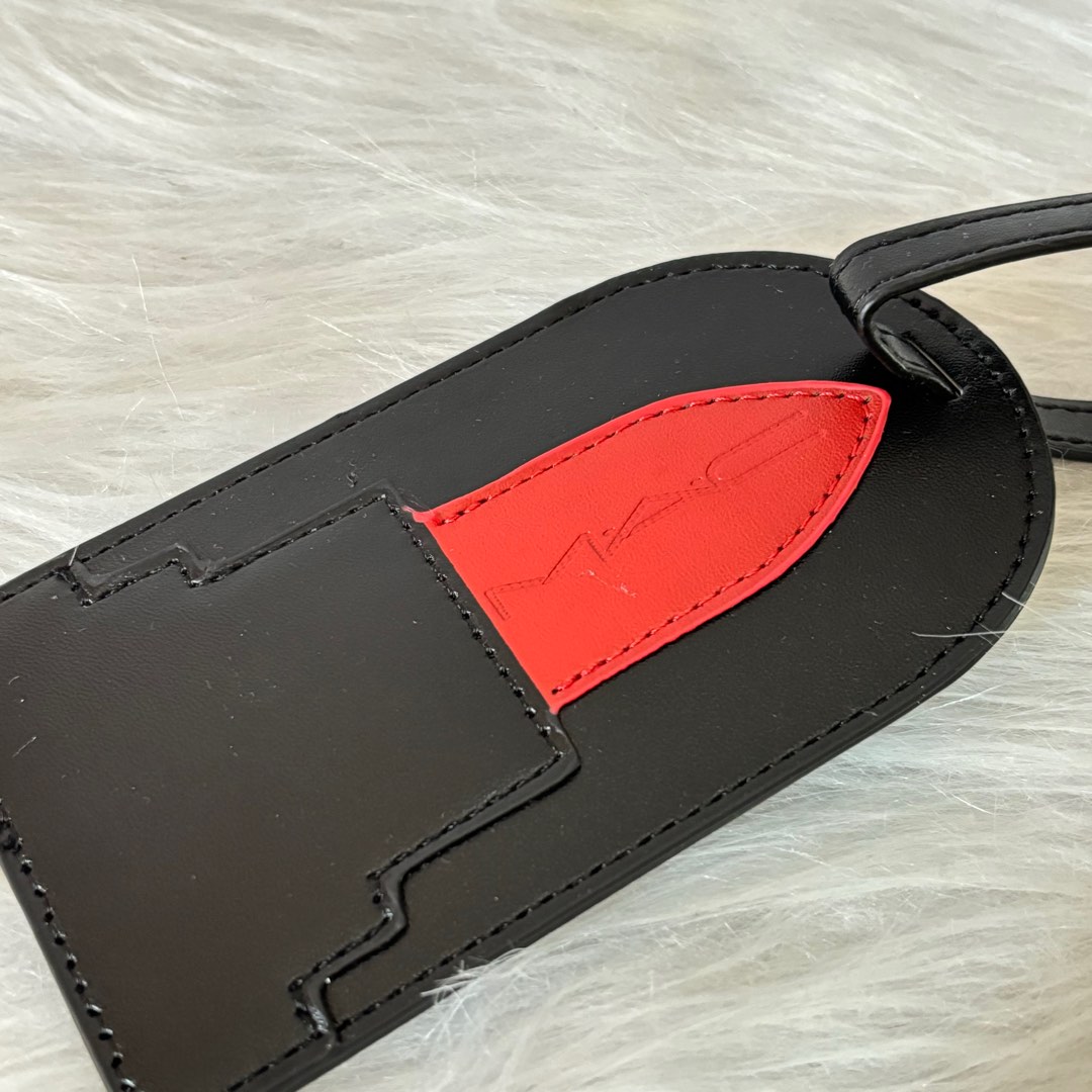 Mac Lip Luggage Tag, Women's Fashion, Bags & Wallets, Clutches on Carousell