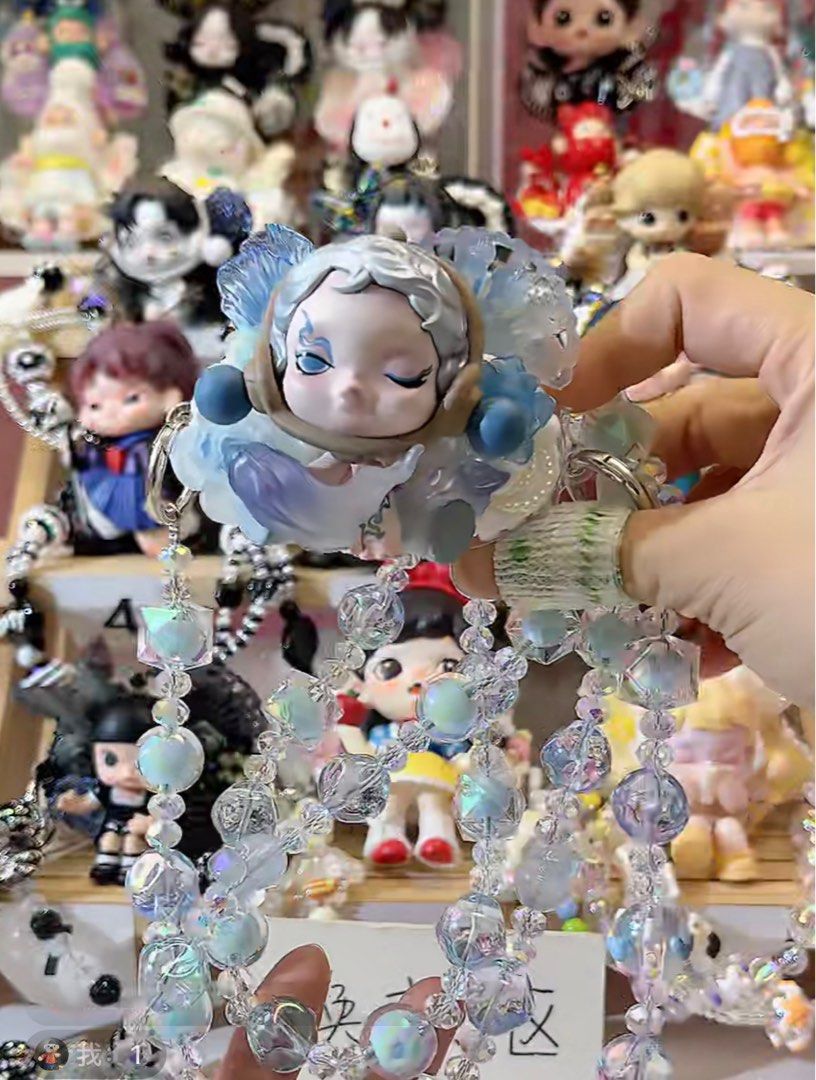 Phone holder with popmart figurine, Hobbies & Toys, Toys & Games on ...