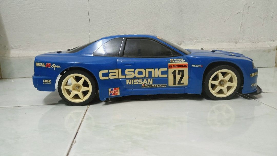 Rc tamiya Qd Nissan Skyline Calsonic. Siap dengan remote adspec Sport ...
