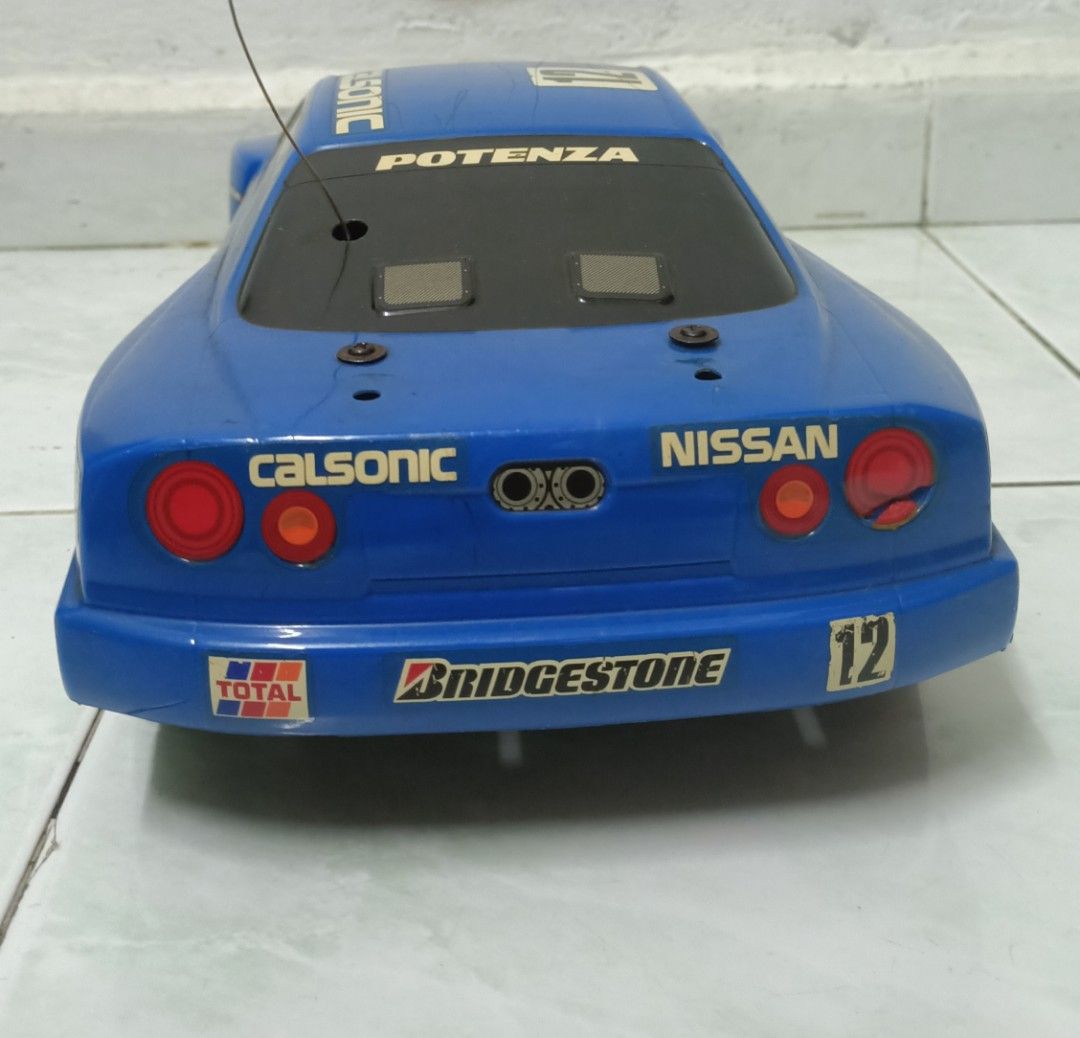 Rc tamiya Qd Nissan Skyline Calsonic. Siap dengan remote adspec Sport ...