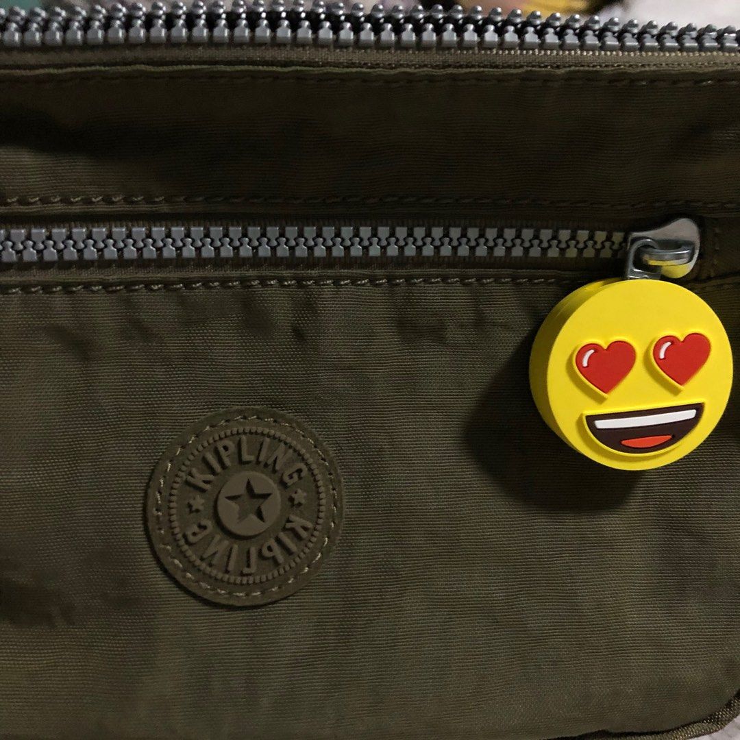 Kipling Emoji Zipper Puller, Hobbies & Toys, Travel, Travel Essentials ...