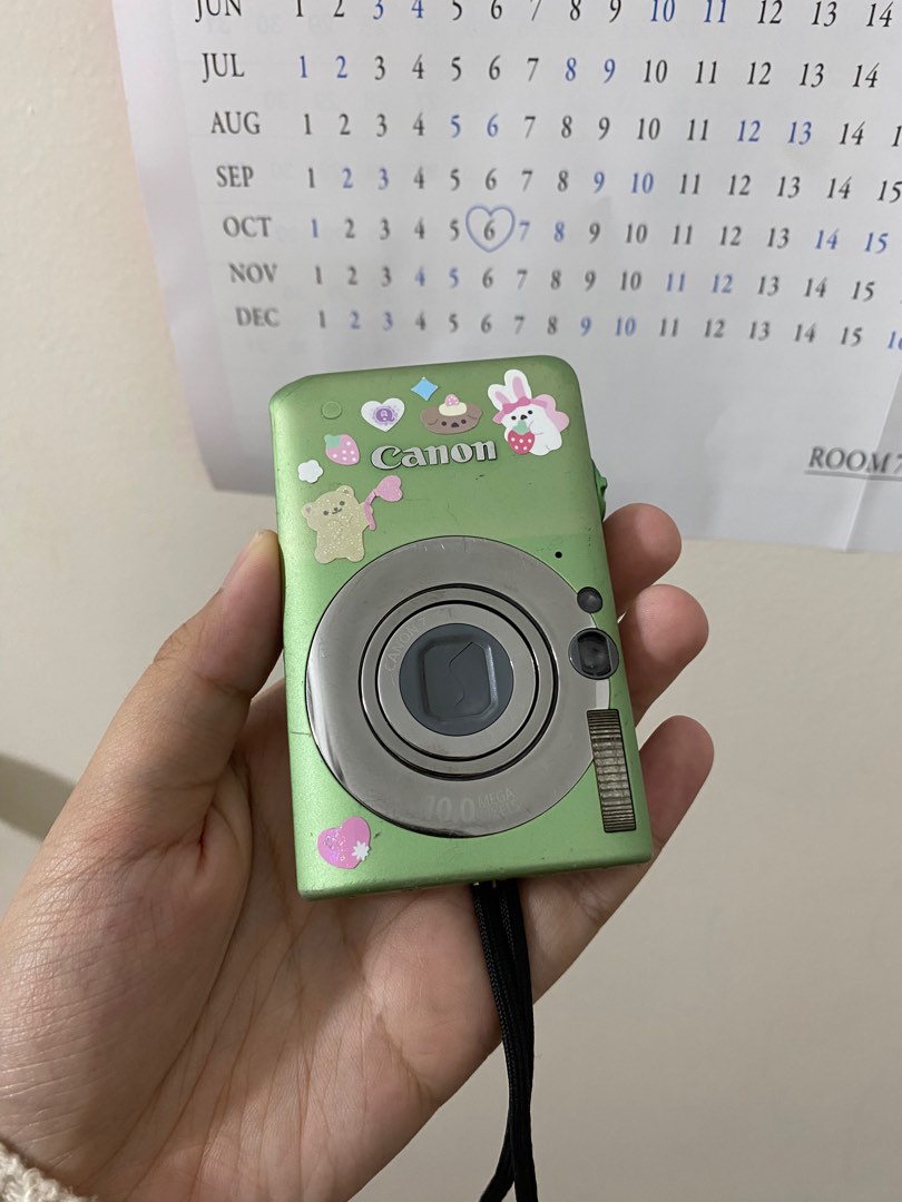 RARE canon ixus 95 in melon green, Photography, Cameras on Carousell
