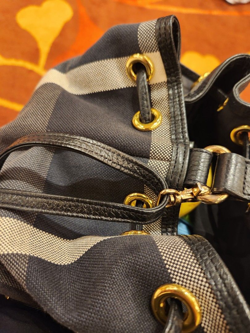 Blue label bucket bag, Luxury, Bags & Wallets on Carousell
