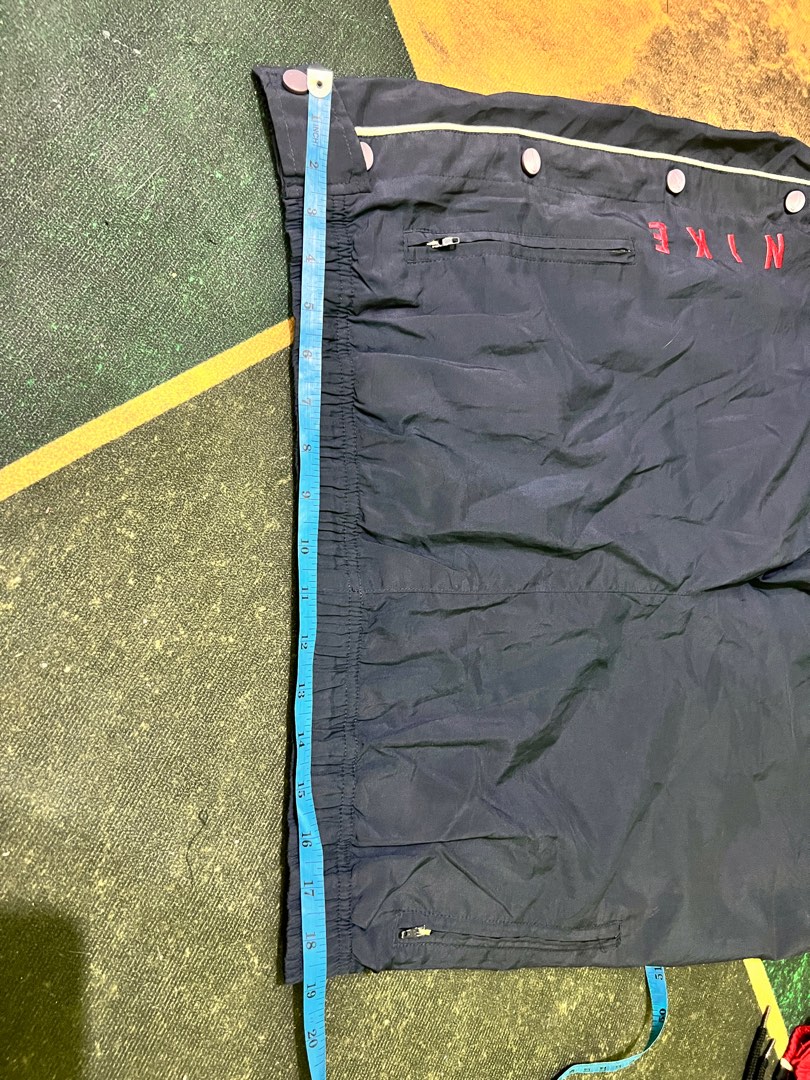 Nike side button, Men's Fashion, Bottoms, Joggers on Carousell