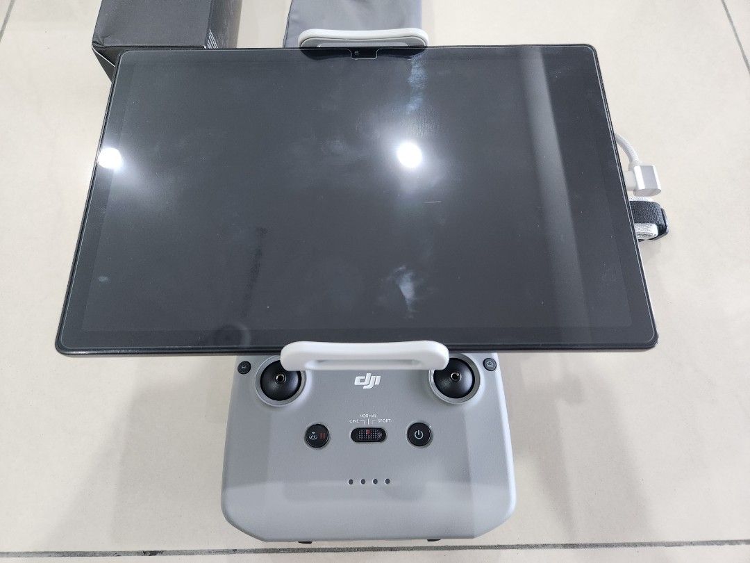 DJI Controller Tablet Holder, Photography, Drones on Carousell