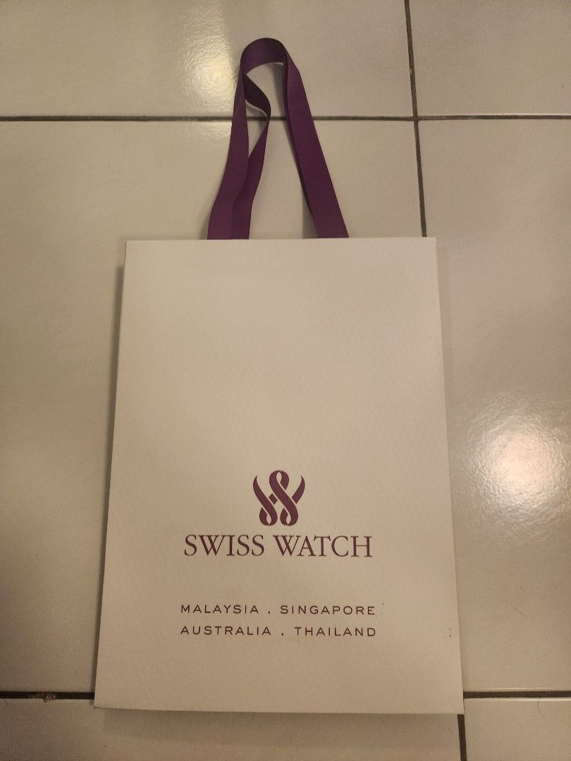 Swiss watch paper bag, Women's Fashion, Bags & Wallets, Tote Bags on ...