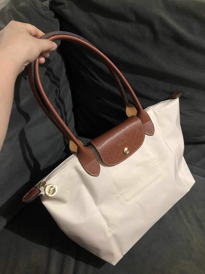Original Authentic Longchamp La Pliage in Cream, Luxury, Bags & Wallets ...