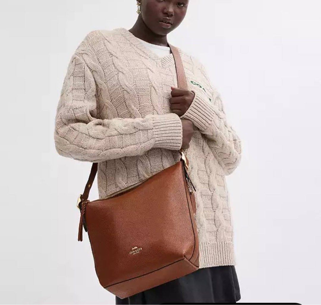 Coach Val Duffle in Redwood, Luxury, Bags & Wallets on Carousell